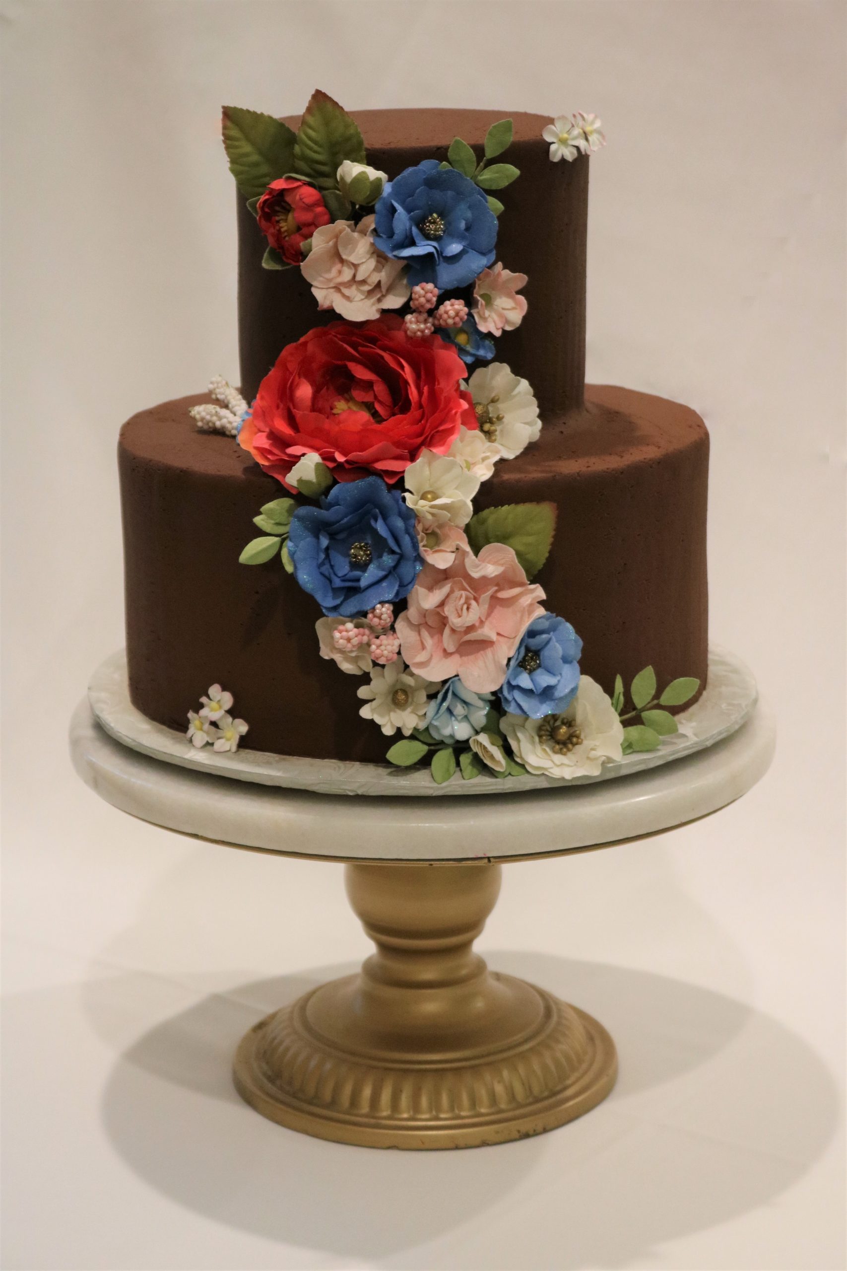 2 Tier Chocolate Buttercream Wedding Cake with Bright Colored Flowers ...